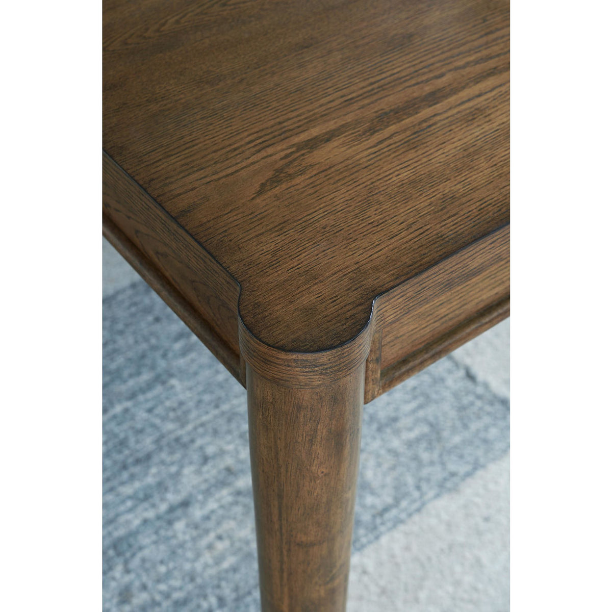 Roanhowe-Exclusive Dining Extension Table | Ashley Canada